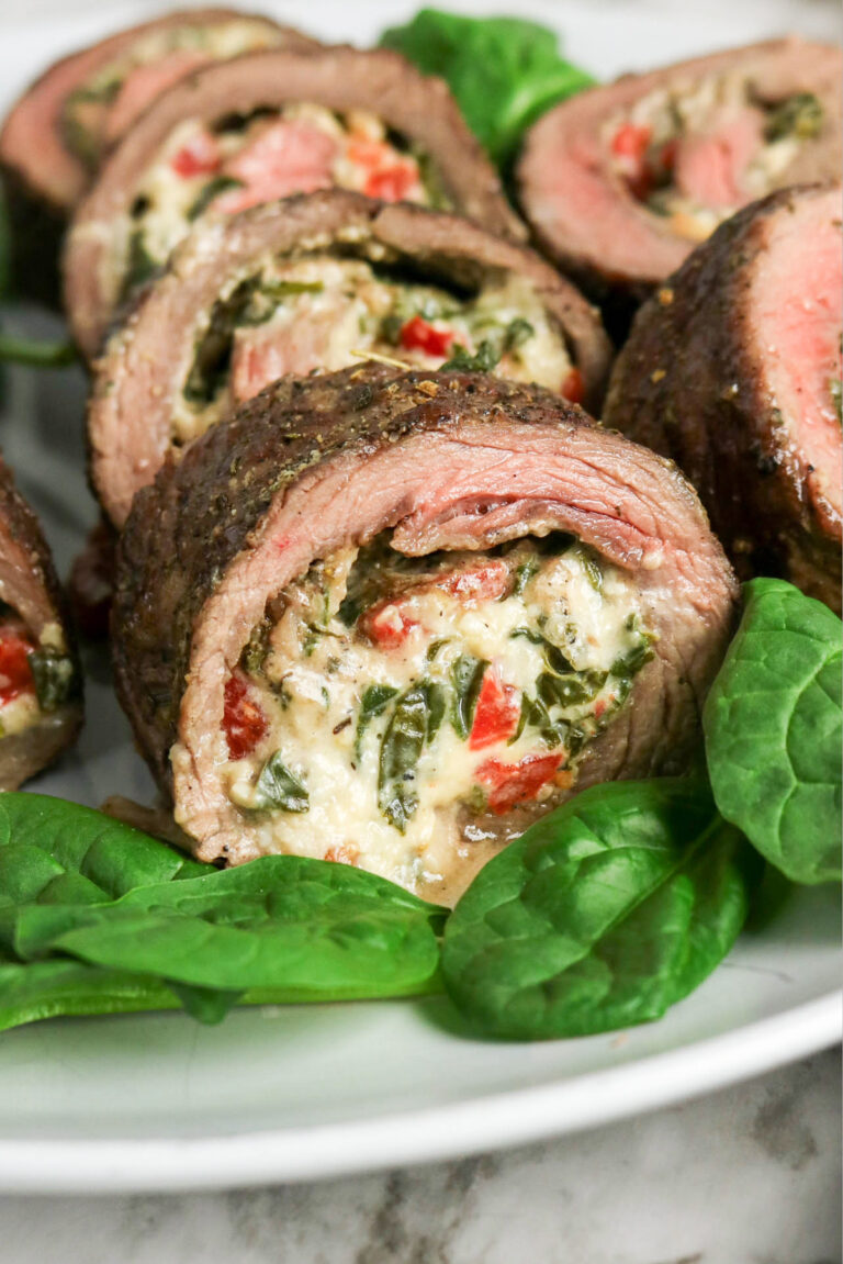 Stuffed Flank Steak Recipe With A Savory Filling - The Foodie Affair