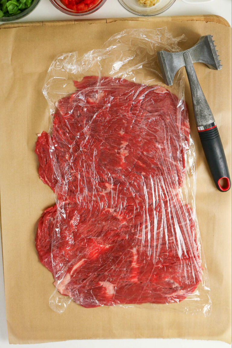 Stuffed Flank Steak Recipe With A Savory Filling - The Foodie Affair